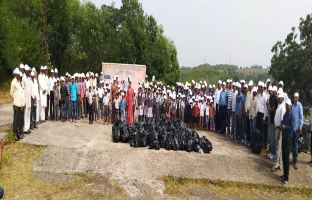Cleanliness Awareness Program in a neighboring village, Khed City